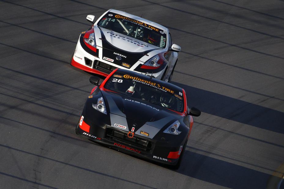 Tim Bell leads Brad Jaeger in a practice session at Indianapolis Motor ...