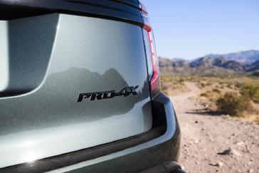 Close up of the blacked-out PRO-4X logo on the back of a 2025 Nissan ...