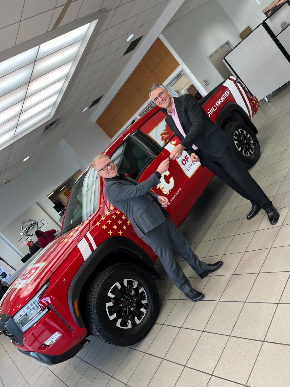 John Bean, President and CEO of the Calgary Flames and Steve Milette ...